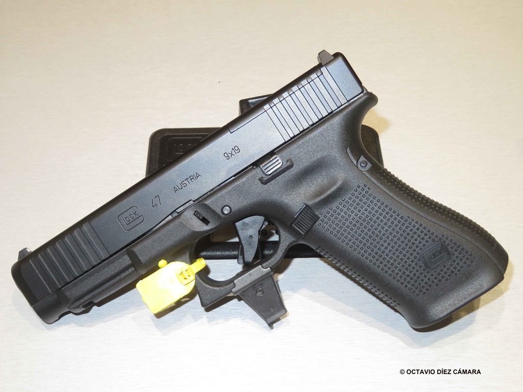 Fondo De Pantalla De Armas Pistola Glock 1.223.932 Armas Stock Photos,